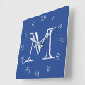 Monogram White Script Roman Numbers On Blue wccn Square Wall Clock | Zazzle