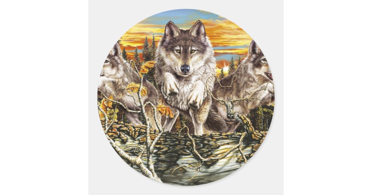 Pack of wolves jumping over a log classic round sticker | Zazzle